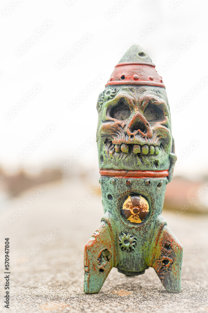 skeleton face nuclear bomb with radiation symbol with blurred out ...