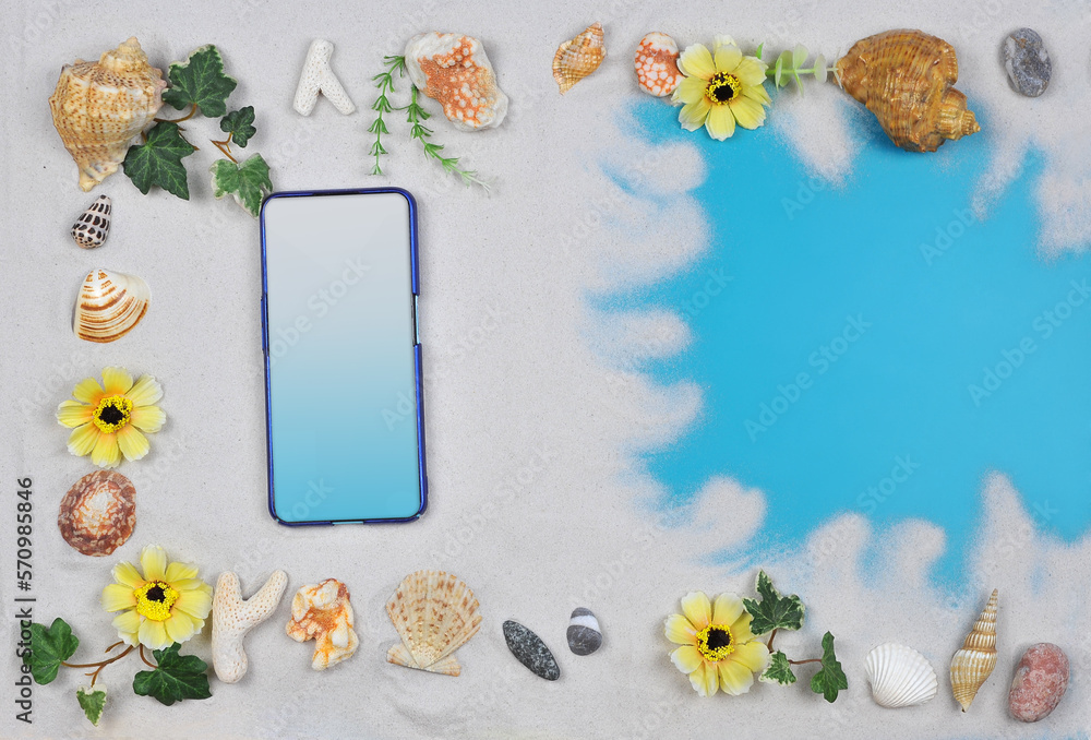 blue frame with sand ,seashells of different shapes and sizes , pebbles ...