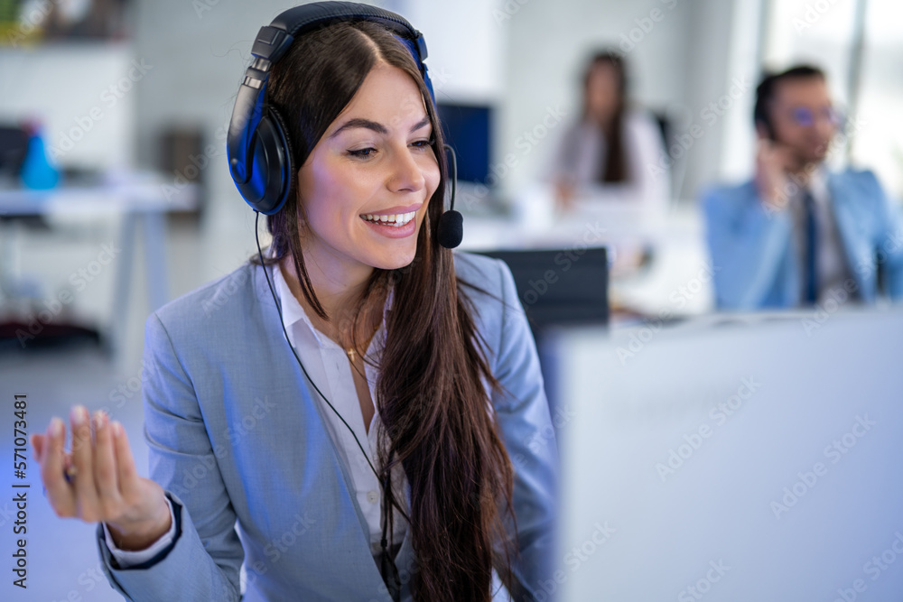 Foto de Portrait of beautiful woman helpdesk operator with headset ...