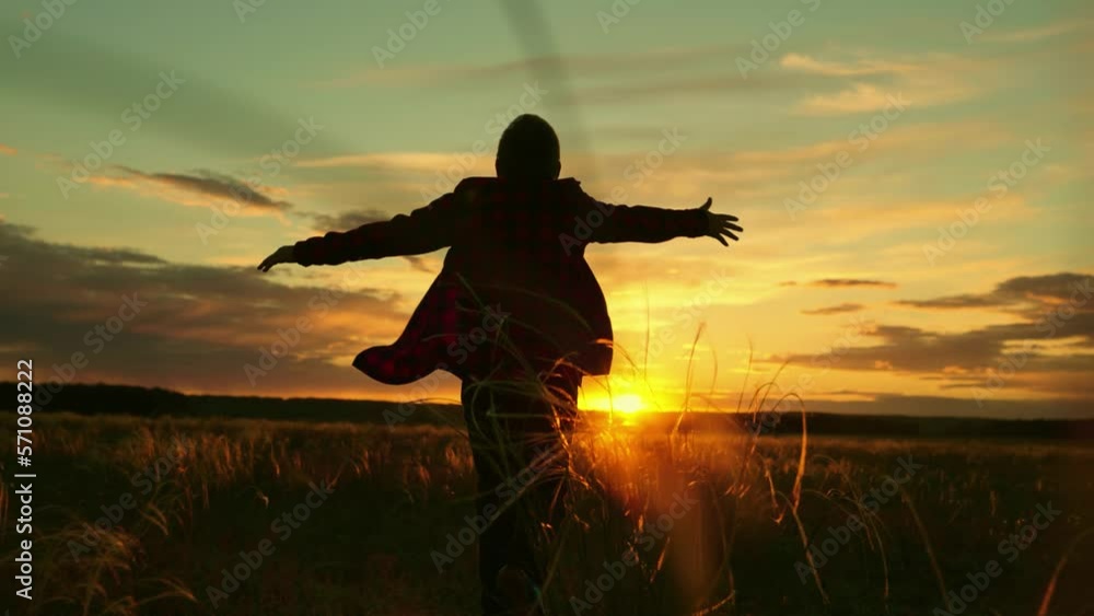 Video Stock Child aviator runs across field, child dreams of becoming ...