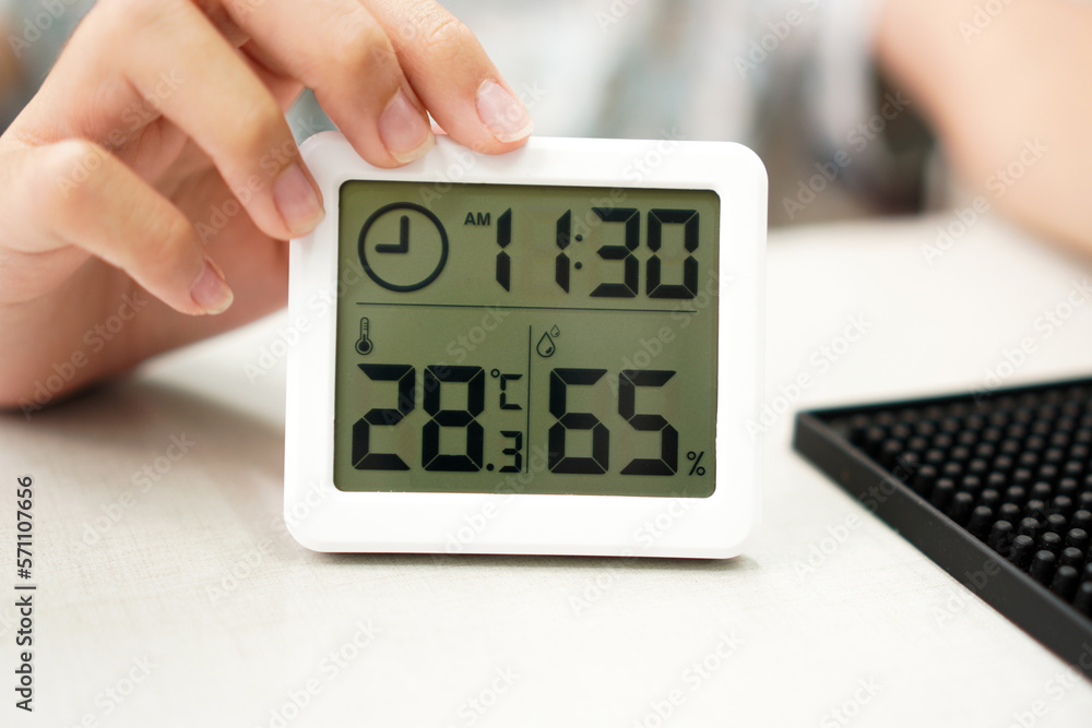 The picture shows a device for measuring temperature, humidity and time ...