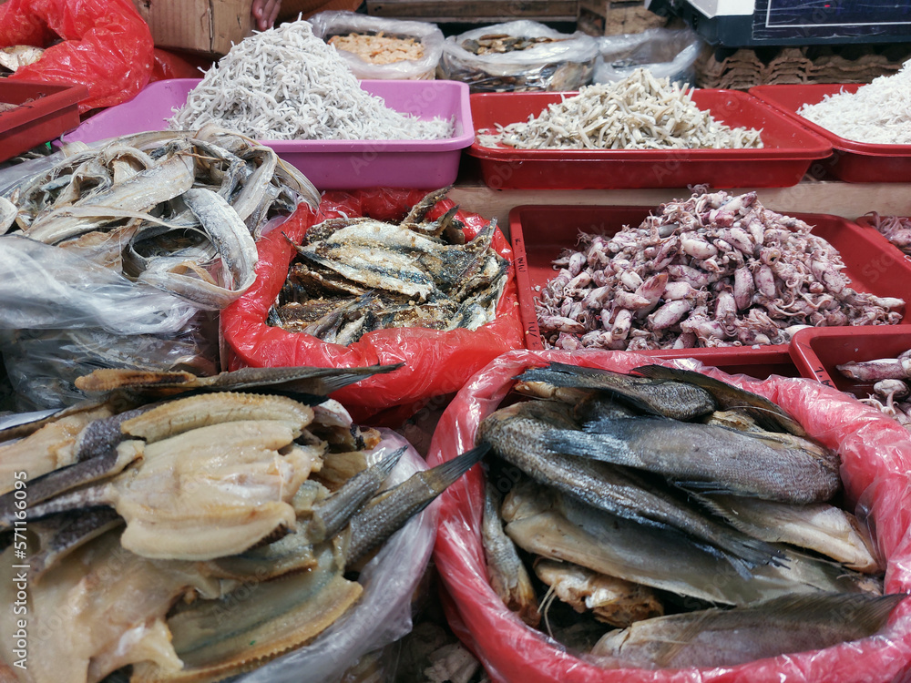 Dry salted cod fish or ikan asin for sale at market, is fish cured with ...
