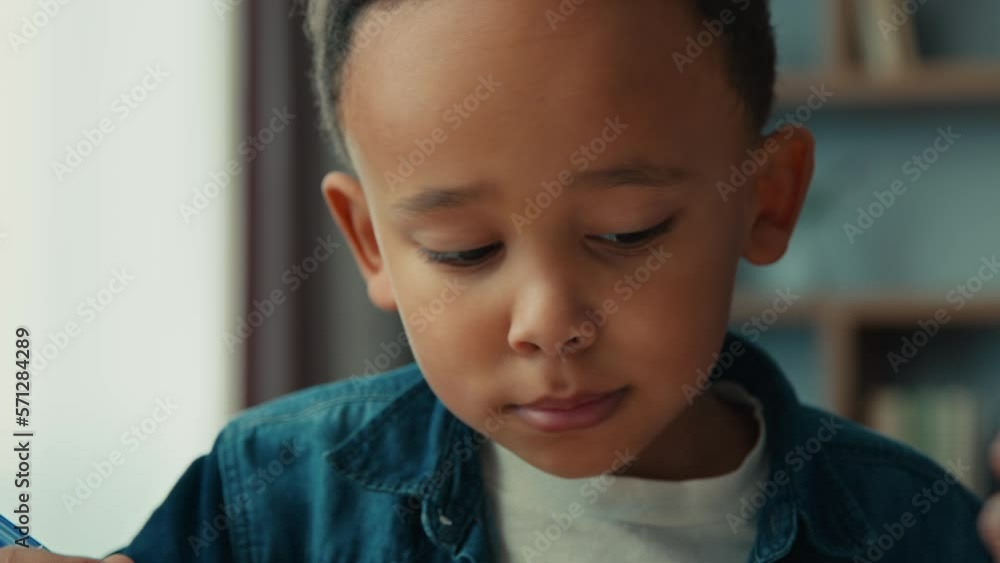 Concentrated smart African American schoolboy Latin preteen school boy ...