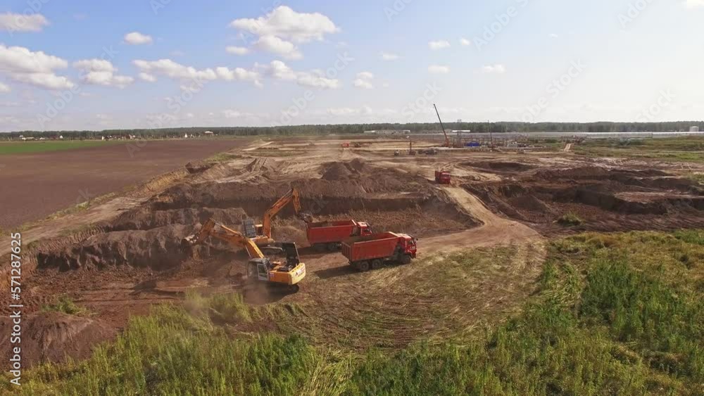 Construction excavators is working and digging at construction site ...
