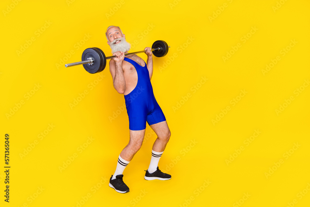 Full body photo of handsome strong grandfather hold press lift barbell ...