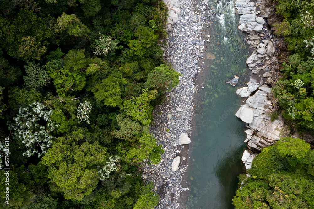 Aerial top down view, tranquil scene of a sub tropical mountain river ...