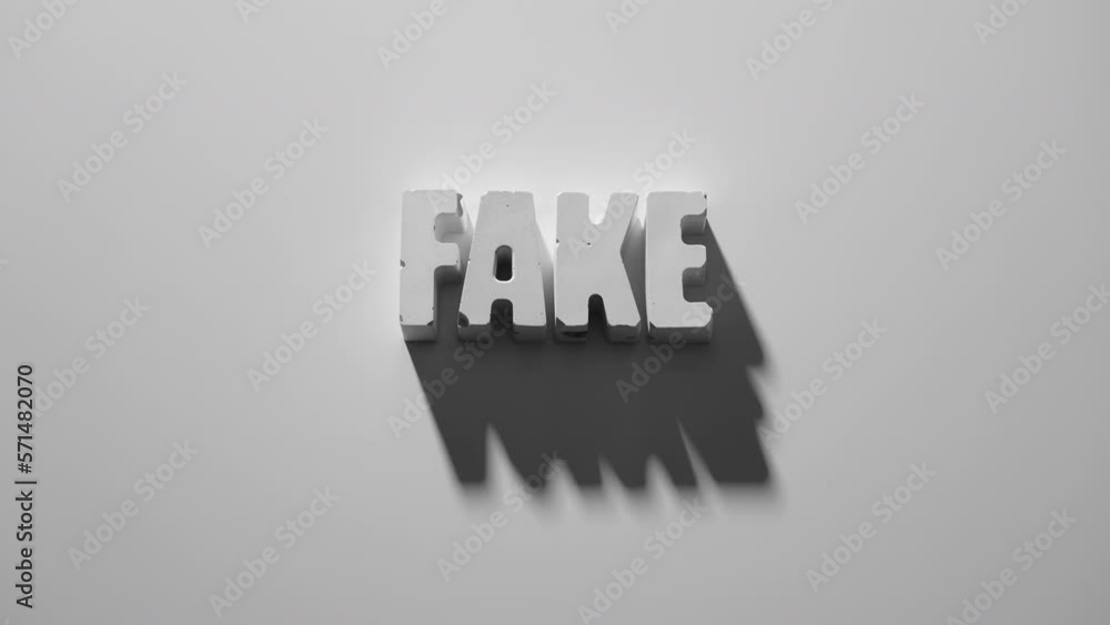 the-word-fake-appearing-letter-by-letter-on-white-background-with