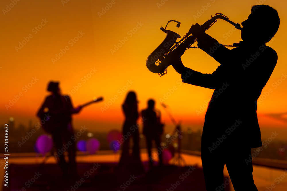 Silhouette saxophone musician man showing on blurry jazz trio band and ...