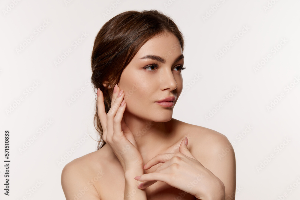 Portrait of young beautiful woman with perfect smooth skin isolated ...