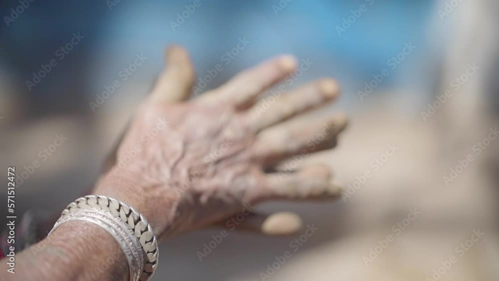 Old lady potter making gullak or Diya clay on potters wheel , Handwork ...