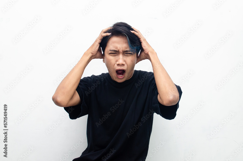 Foto de asian man with peek a boo hair screaming madly and angrily ...