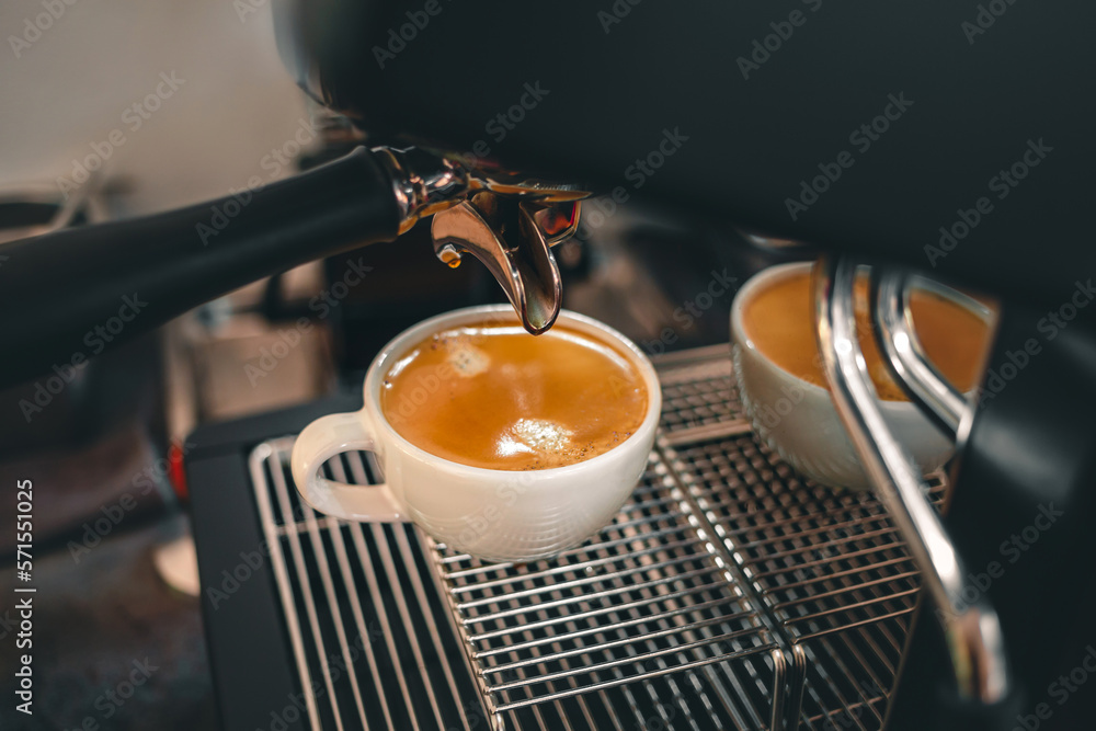Espresso coffee extraction from a professional coffee machine with a ...