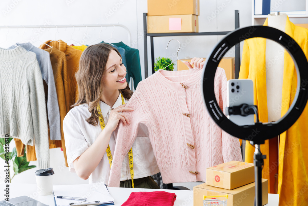 Beautiful woman describe selling clothes on camera live broadcast on ...