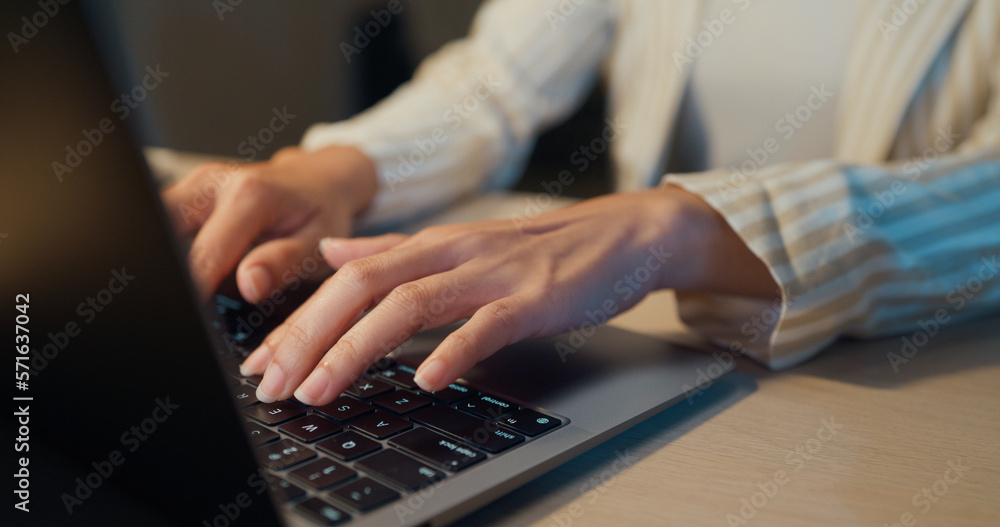 Close-up Young Asia businesswoman wear formal sit front of desk with ...