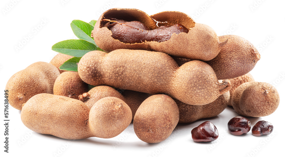Ripe tamarind fruit, leaves and some tamarind seeds isolated on white ...