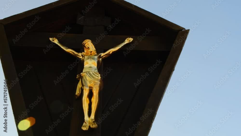 Jesus Christ on the cross on the sky with the rays of the sun ...