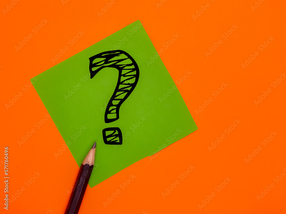 Green paper with pencil with question mark symbol on white background ...