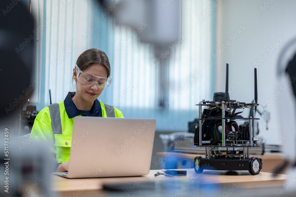 Engineer factory industry control automation welding robot arms machine ...