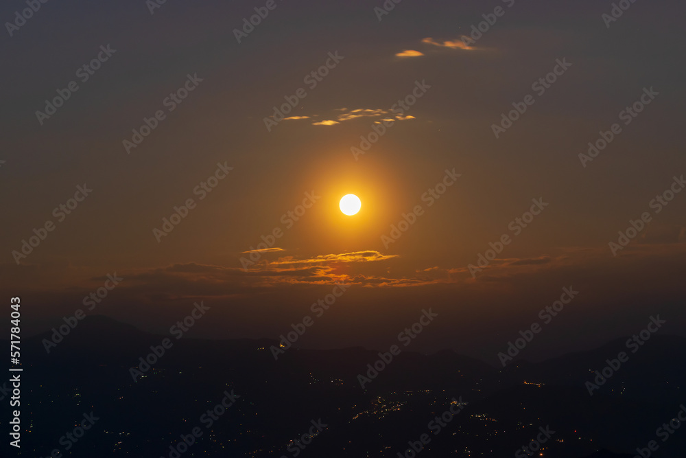 Rise of the orange moon, also known as the harvest moon or the hunter's ...