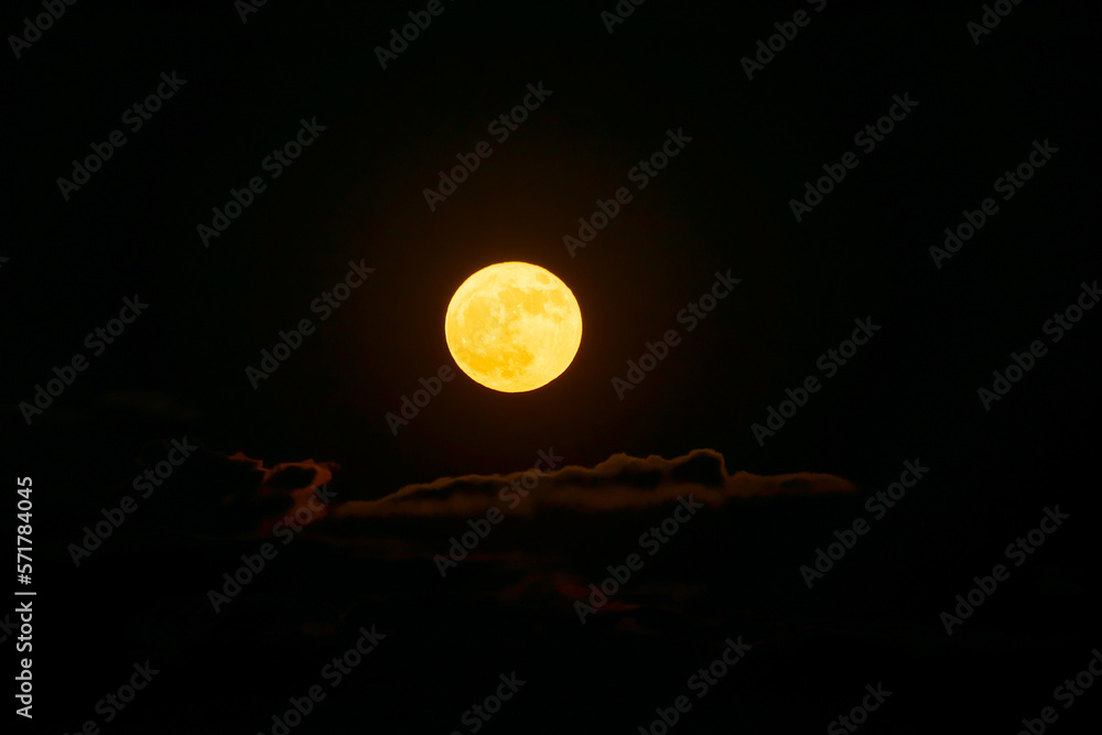 Rise of the orange moon, also known as the harvest moon or the hunter’s ...