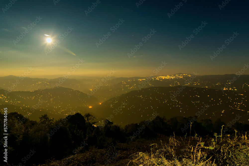 Pearls of light of Queen of Hills, Darjeeling town, at night at far ...