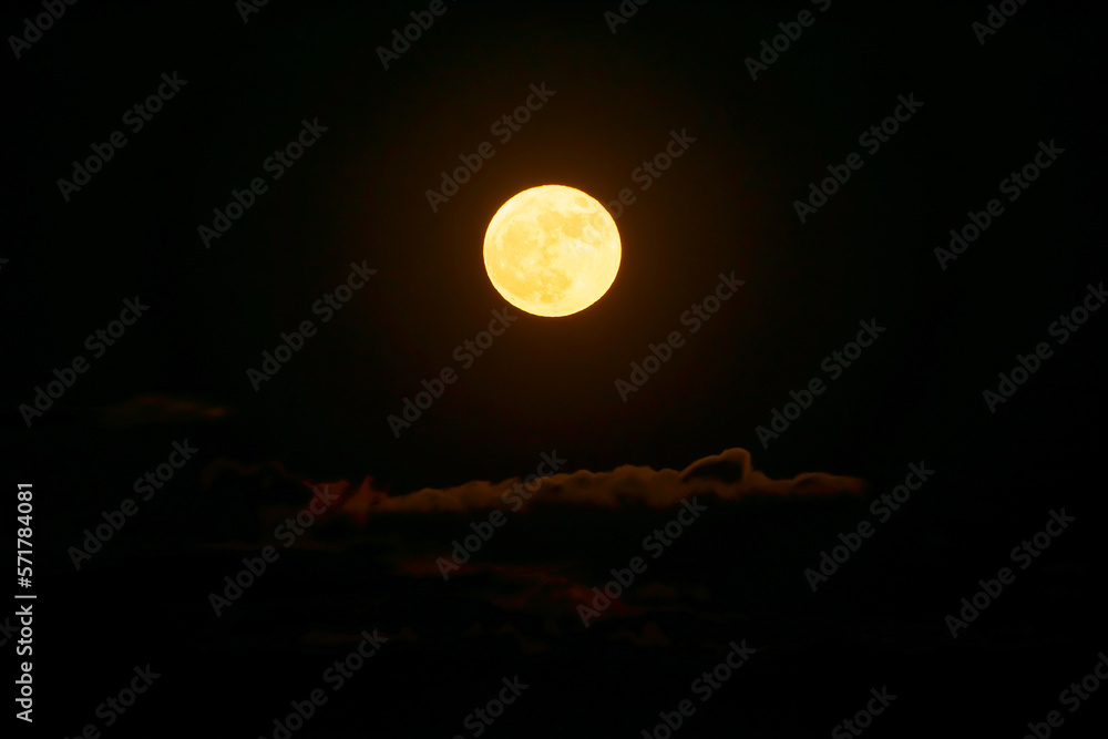 Rise of the orange moon, also known as the harvest moon or the hunter’s ...