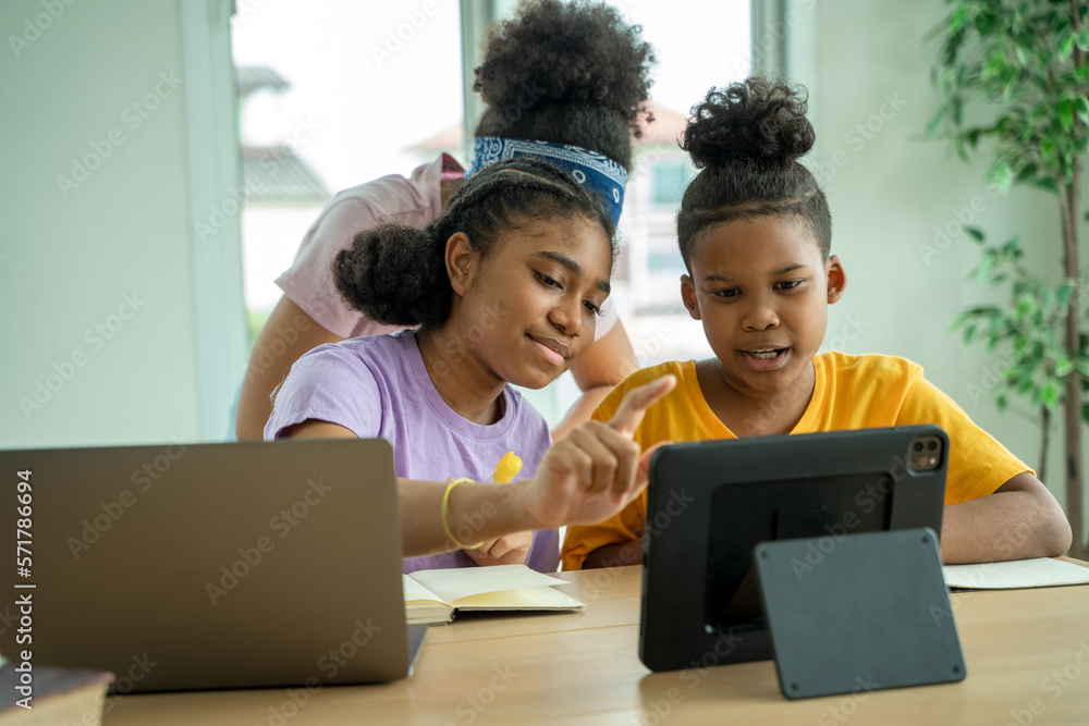 Black girl are taking test in elementary classroom school with diverse ...