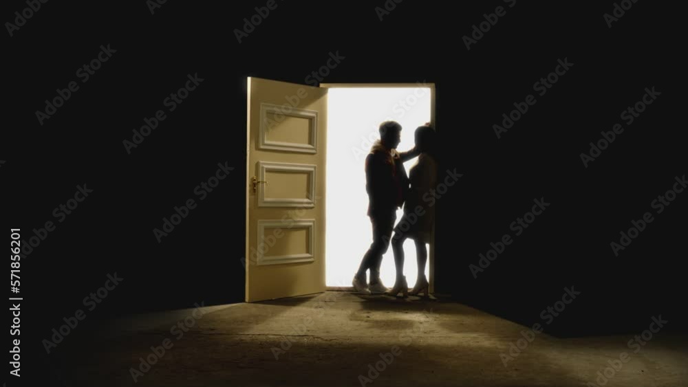 Side view of couple standing opposite and looking each other in front ...