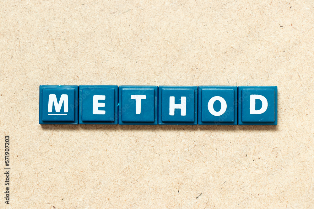 Tile alphabet letter in word method on wood background Stock Photo ...