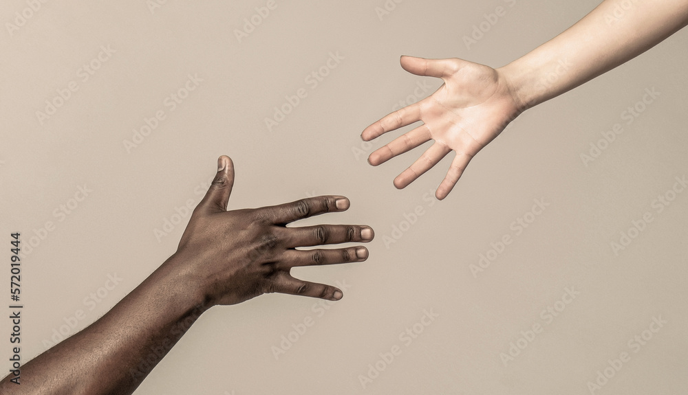 Helping hands, Rescue gesture. Black and white human hands. African and ...
