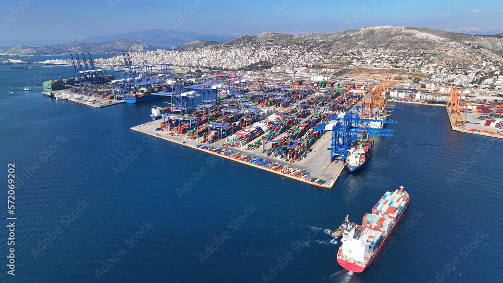 Aerial drone photo of huge fully loaded container tanker ship reaching ...