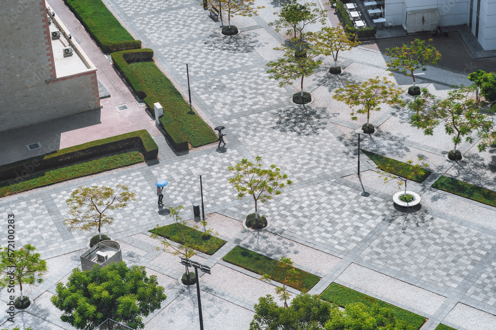 Drone view of an urban landscaped and designed garden with cobblestone ...