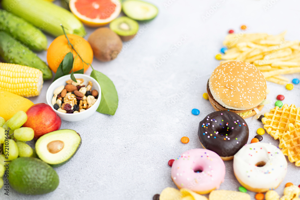 Flat lay of Healthy and unhealthy food from fruits and vegetables vs ...