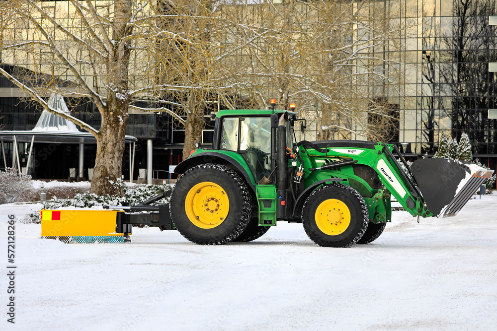 John Deere Tractor Clearing Snow From Parking Lot with Quicke 6M Front ...