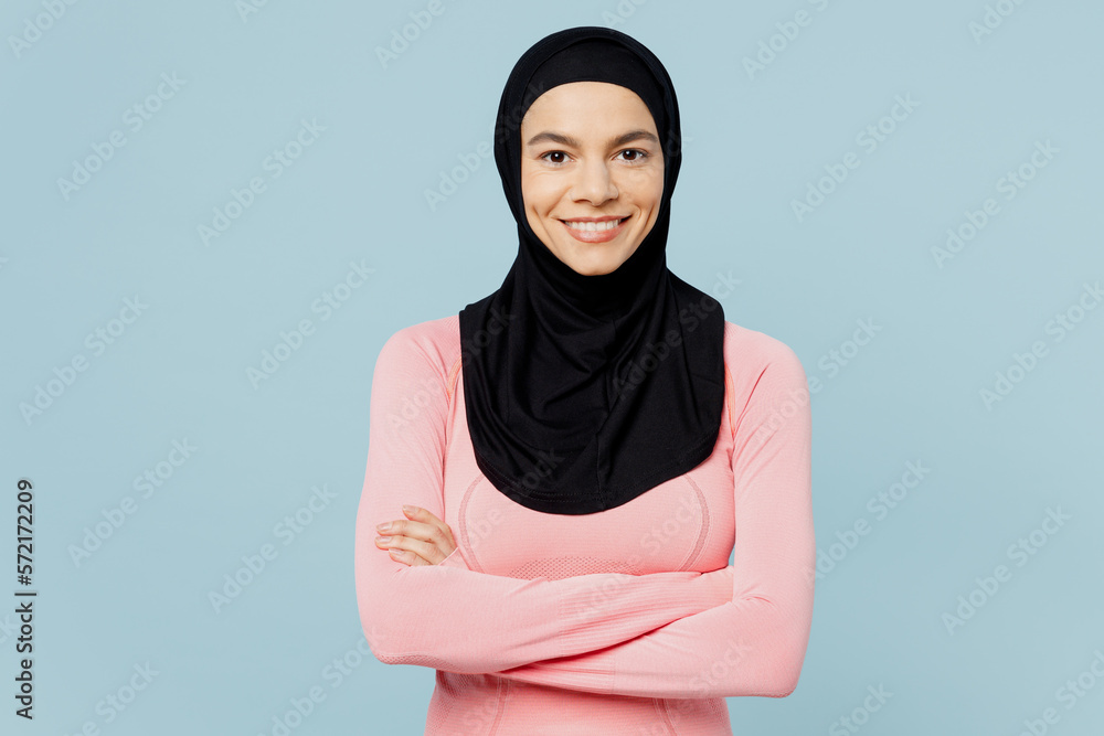 Young arabian asian muslim fitness trainer sporty woman wear pink abaya ...