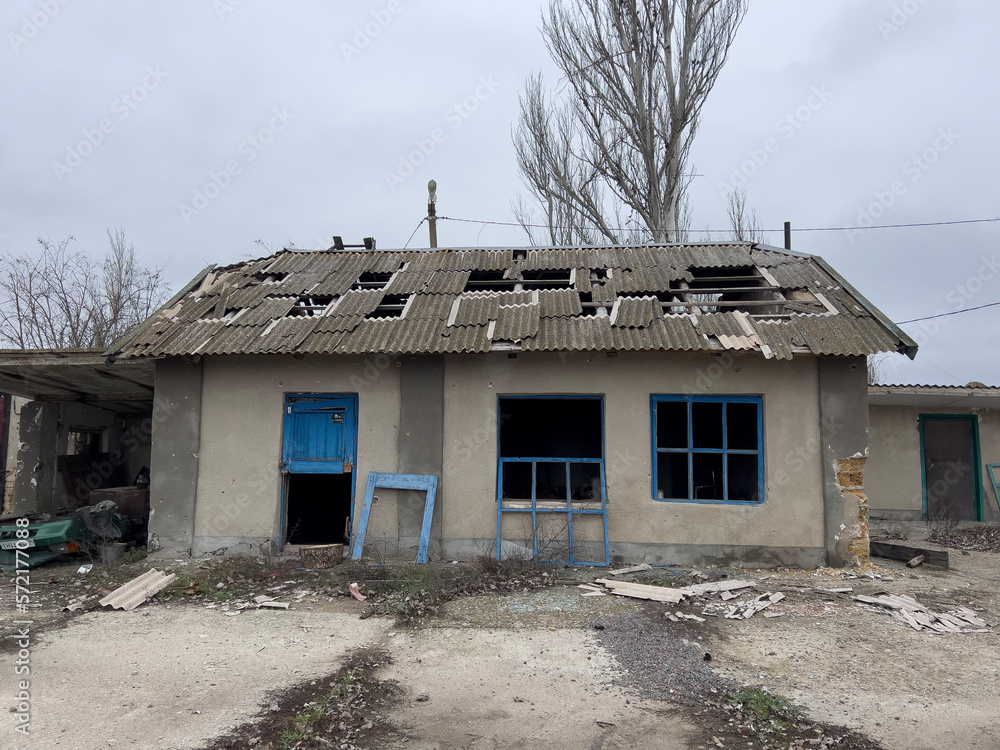 Ukrainian house destroyed by shells with broken windows and a slate ...