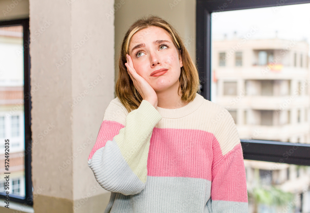 pretty caucasian woman feeling bored, frustrated and sleepy after a ...