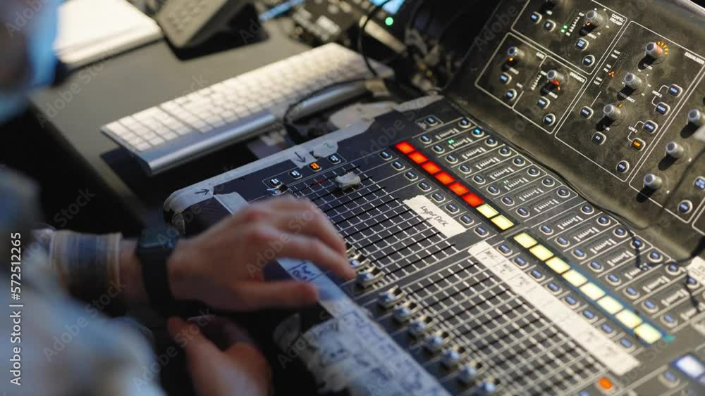 Video Stock Technical director operating a switcher in the control room ...