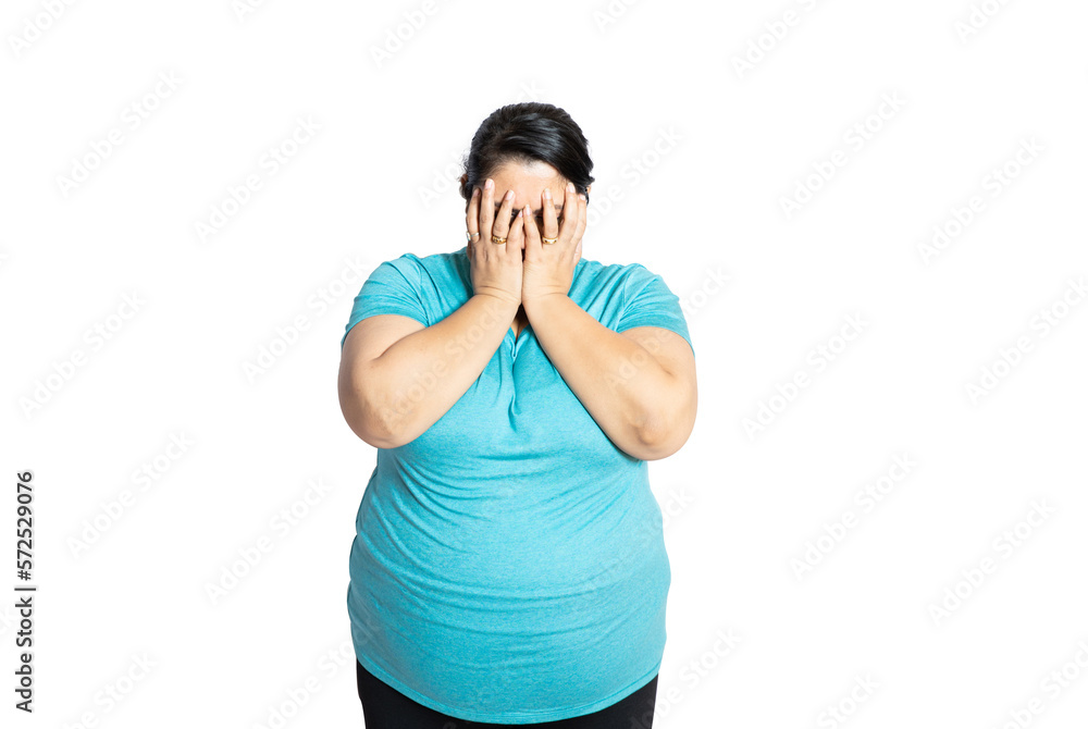 Young overweight indian woman covering eyes with hands feeling ...