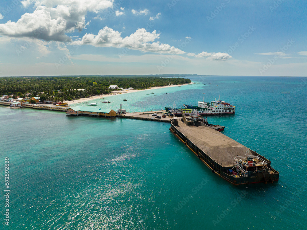 Aerial drone of sea port and ships on a tropical island. Bantayan ...