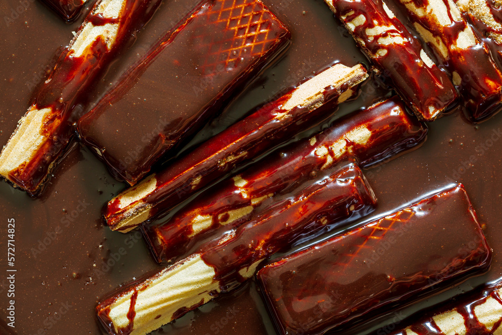 Macro chocolate candy background,Close up of molten chocolate and ...