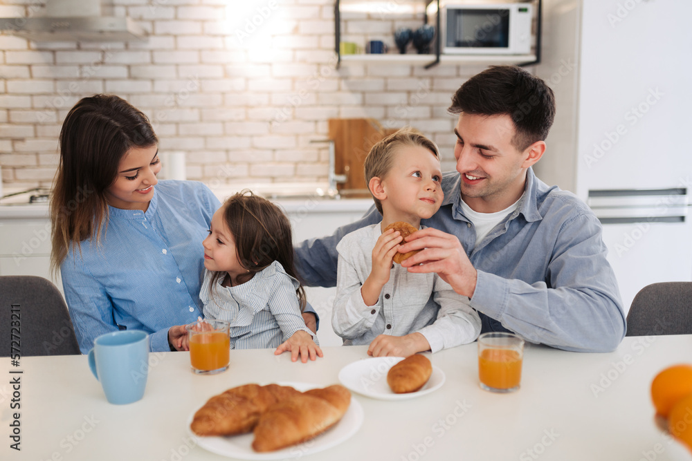 Family, eating and people concept - happy mother, father,daughter and ...