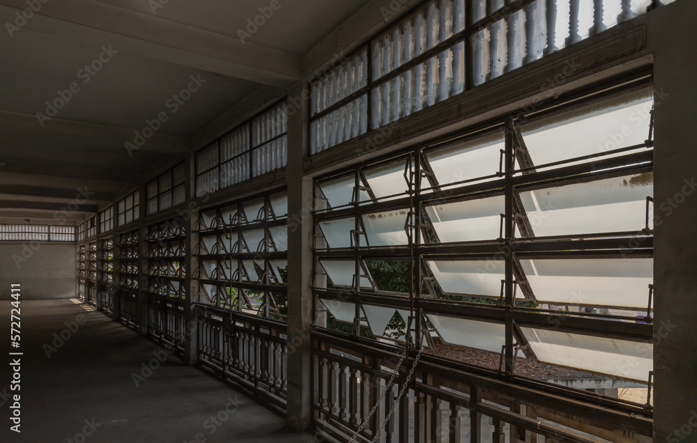 Ancient steel awning windows open for bright light streaming through ...