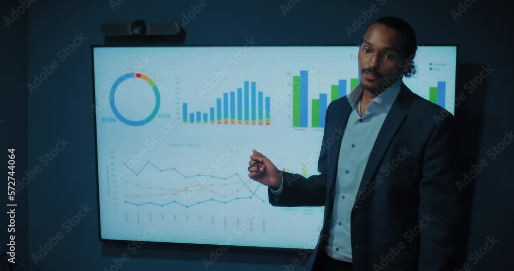 african american business coach speaking in conference, man showing ...