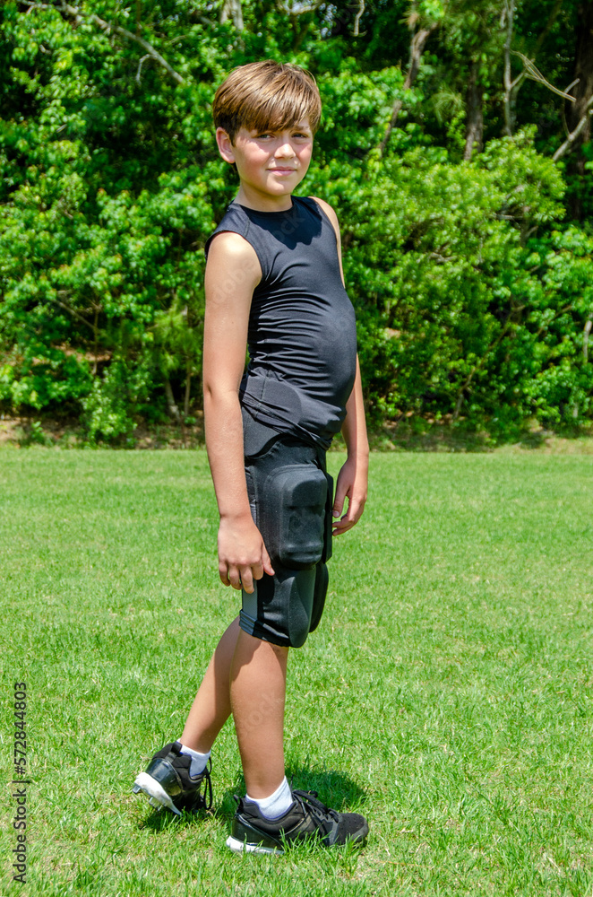 Preteen Youth Boy Football Player Outside Throwing Ball in Uniform ...