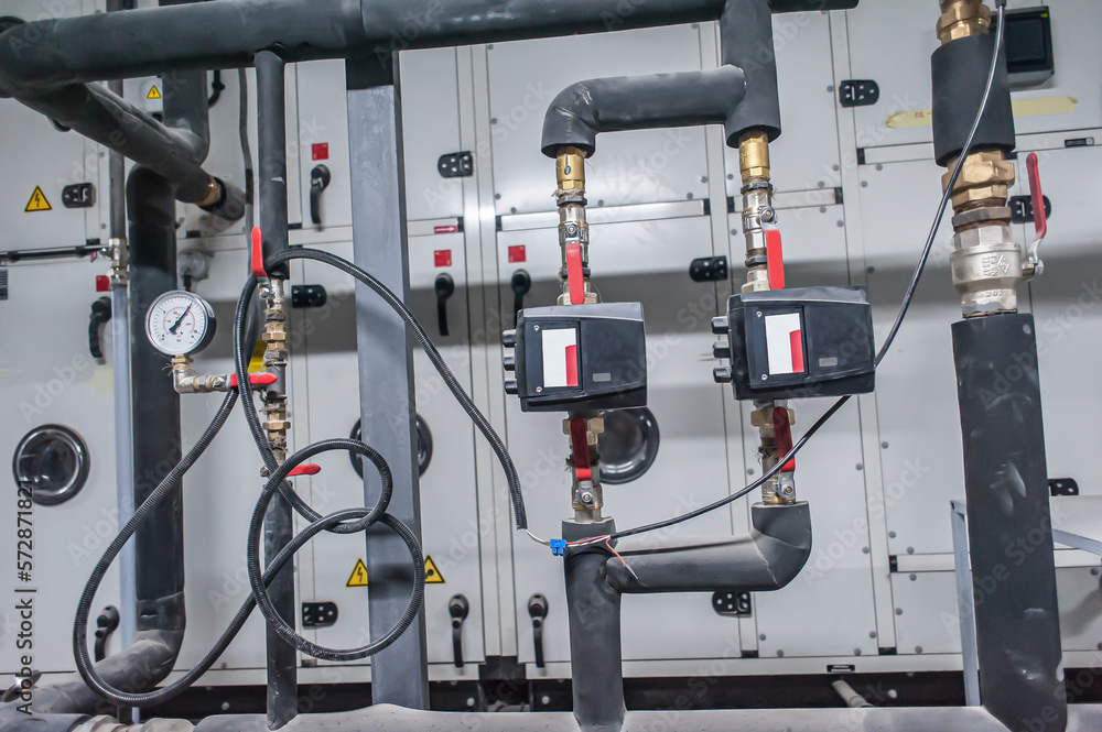 Huge industrial water pump and air handling unit in the ventilation ...