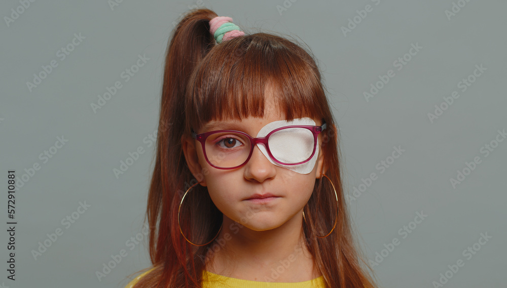Sick ill preteen girl looking at camera having protective bandage ...