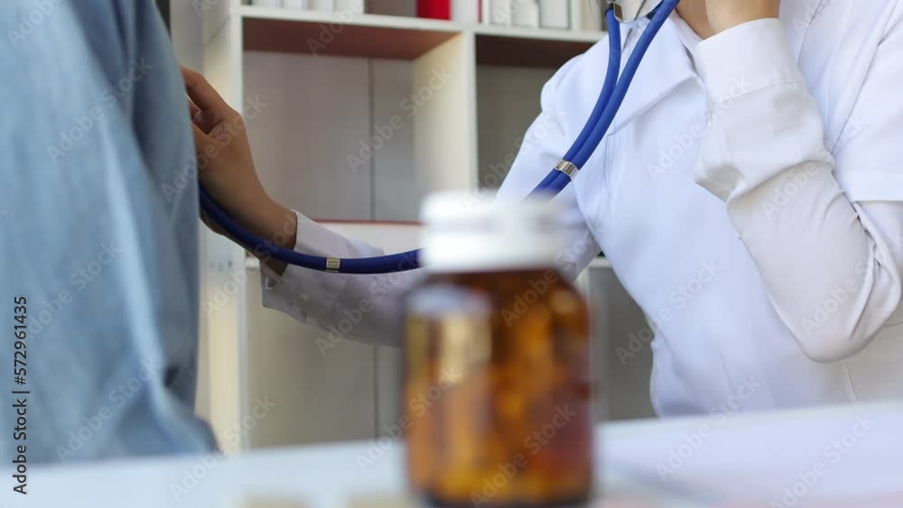 Doctor examining a patient's health using a stethoscope. Medical ...