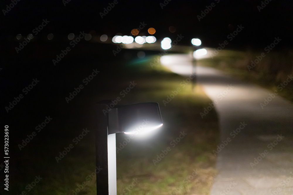 Curvy walk path at night illuminated with a lights in Denmark Europe ...