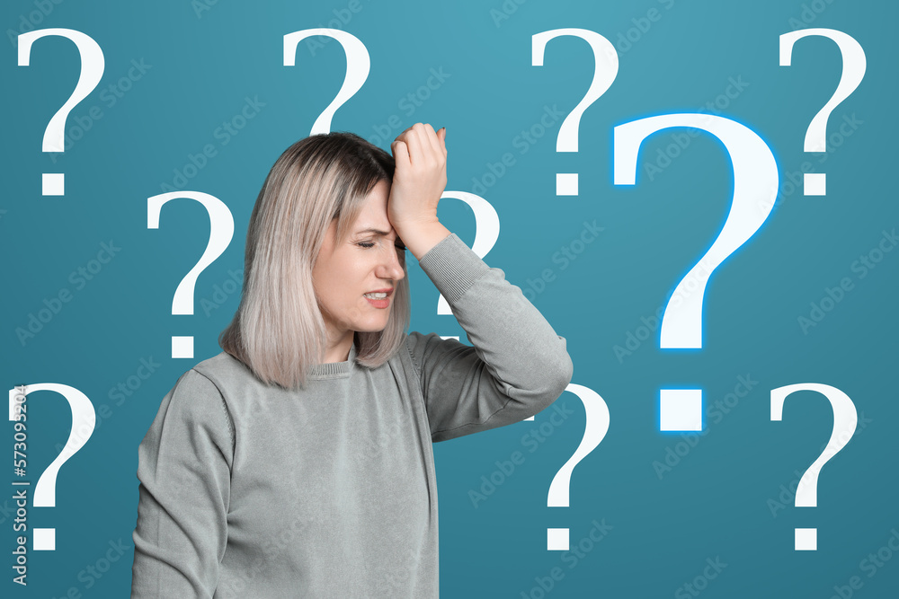 Amnesia concept. Woman trying to remember something. Question marks on ...